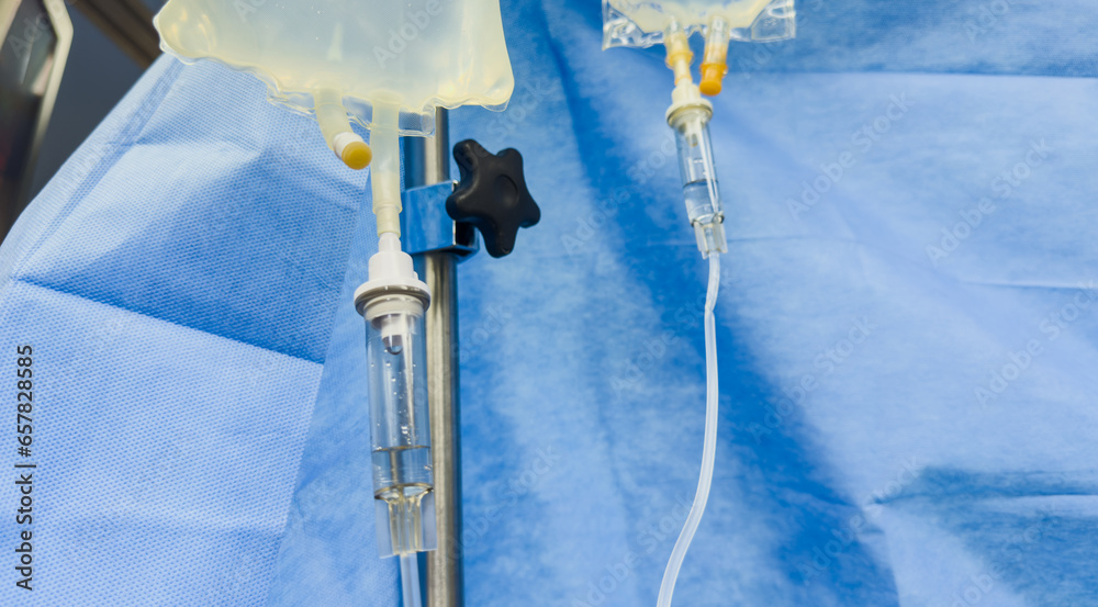hospital IV drip, with translucent tubing and liquid medication flowing ...