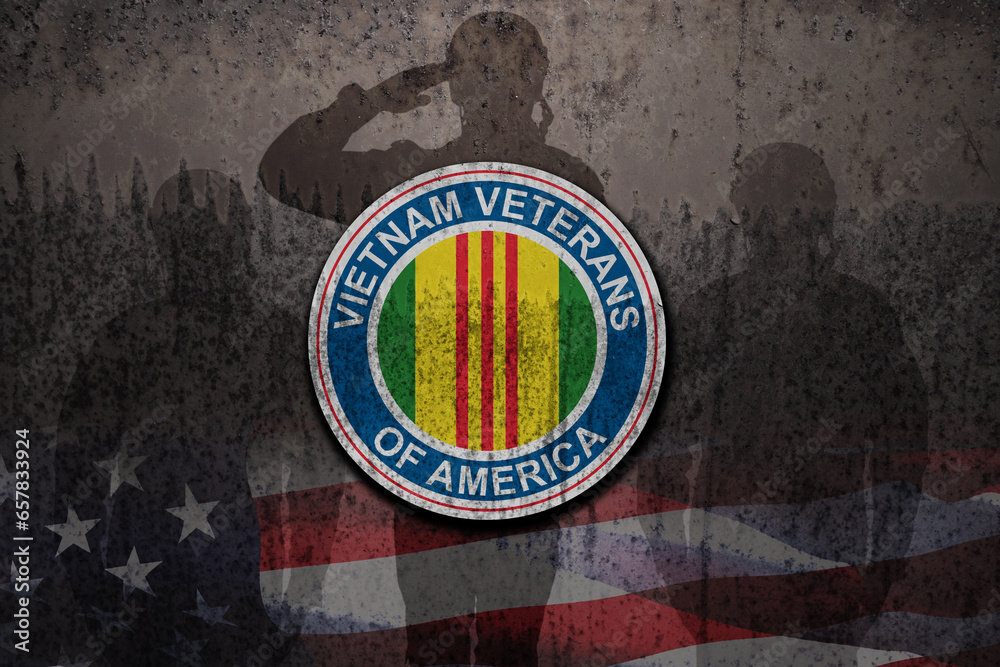 Silhouettes of soldiers saluting and Symbol of the Vietnam Veterans of ...