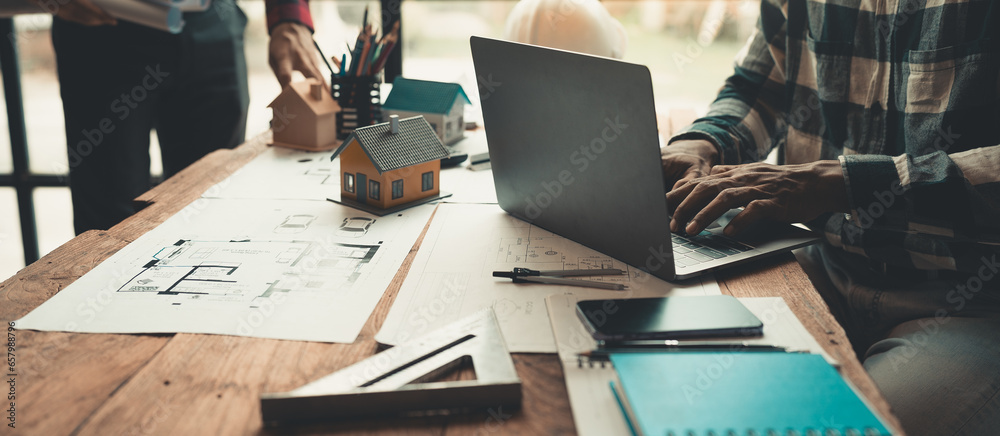 Architects and engineers work together in business, submitting ...