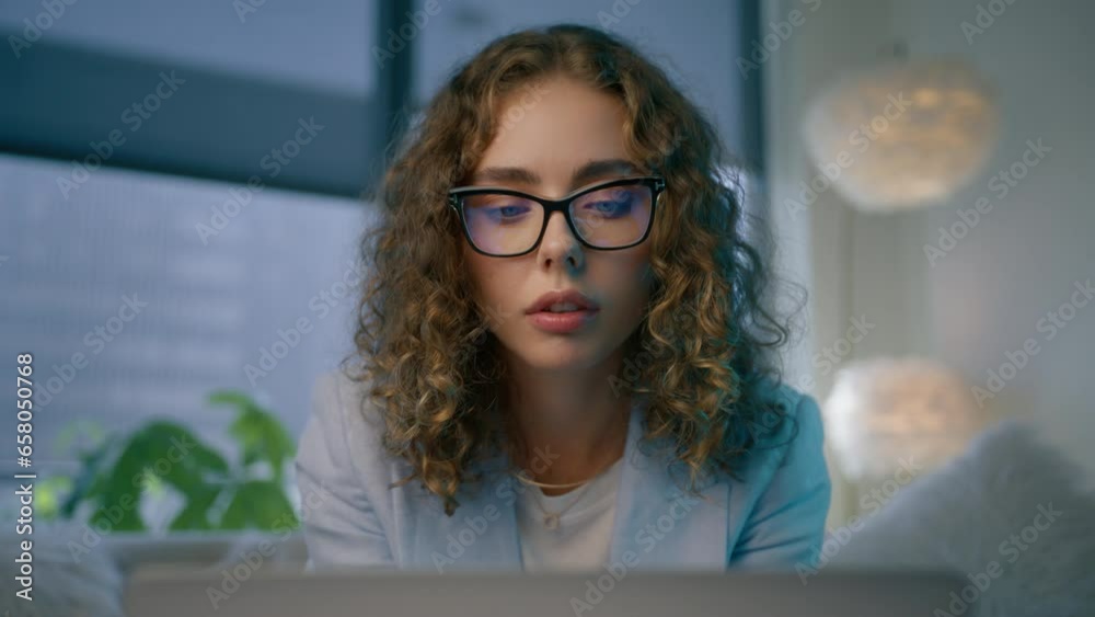 Curly girl college student using laptop computer. Pretty student lady ...