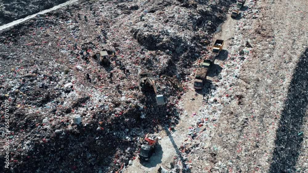 Large Waste Dump and Trash Truck with Garbage in Aerial Top View. Big ...