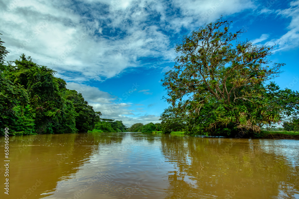 River Rio Frio channel with beautiful landscape of rainforest , POV ...