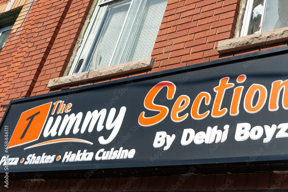 exterior sign and building facade of The Tummy Section by Delhi Boyz ...