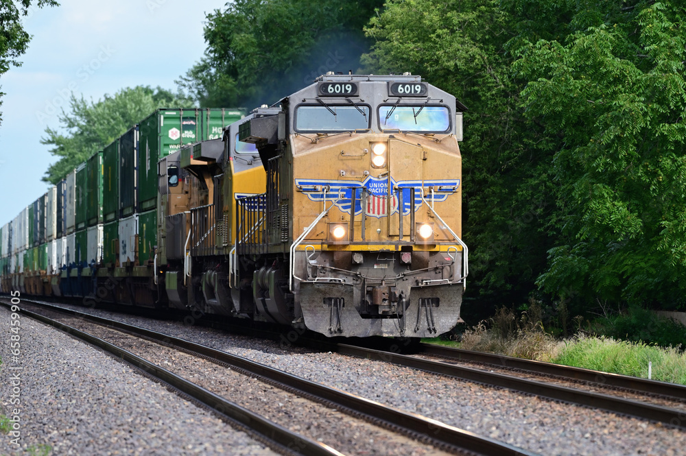 Three Union Pacific locomotives power an intermodal freight train ...