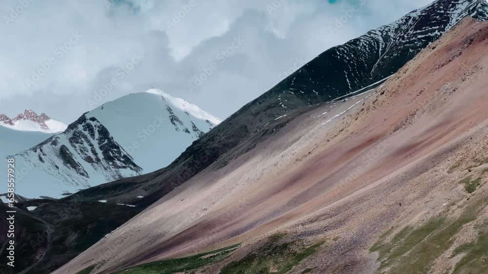 View of Lenin Peak, one of the highest peaks of Central Asia. The Pamir ...