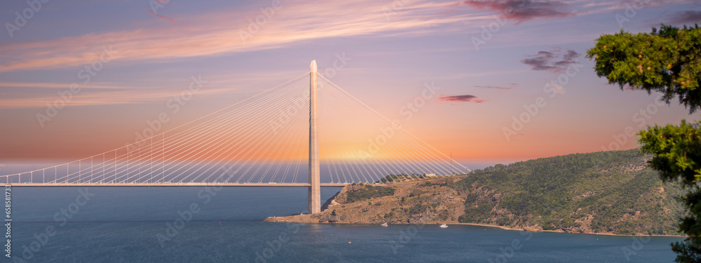 Yavuz Sultan Selim Suspension Bridge after sunrise, a suspension bridge ...