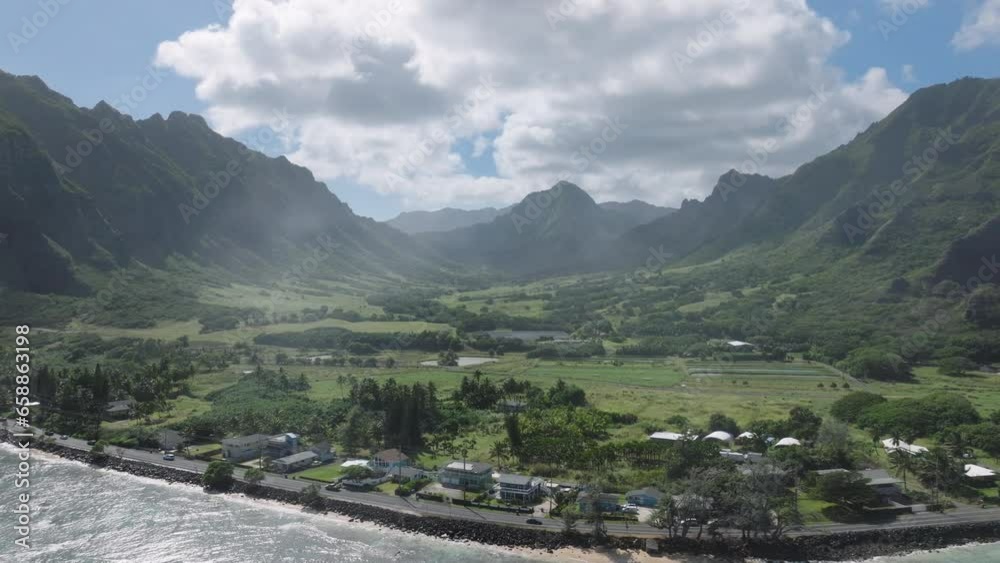 Cinematic aerial Kualoa Ranch Park, Oahu island USA. Drone flying along ...