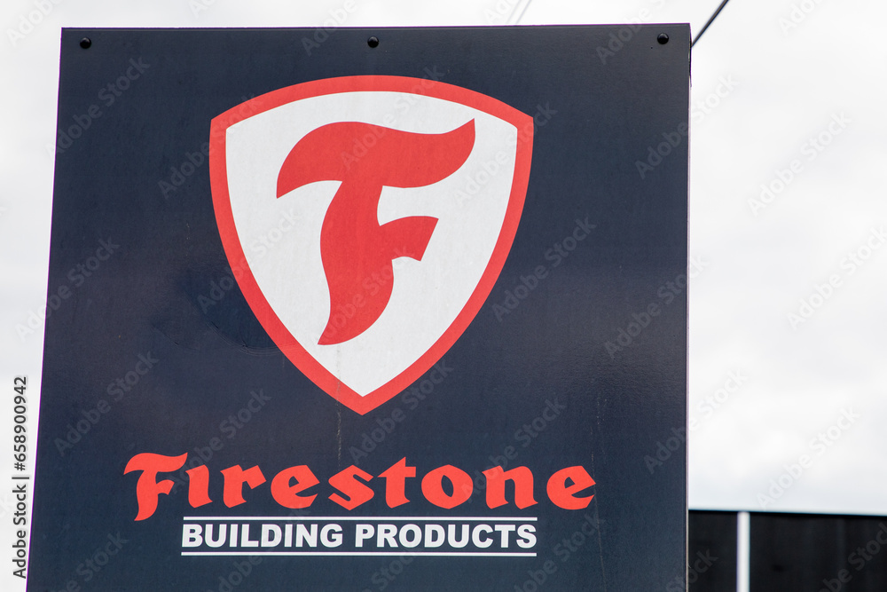 Firestone building products Tire and Rubber Company text brand and logo ...
