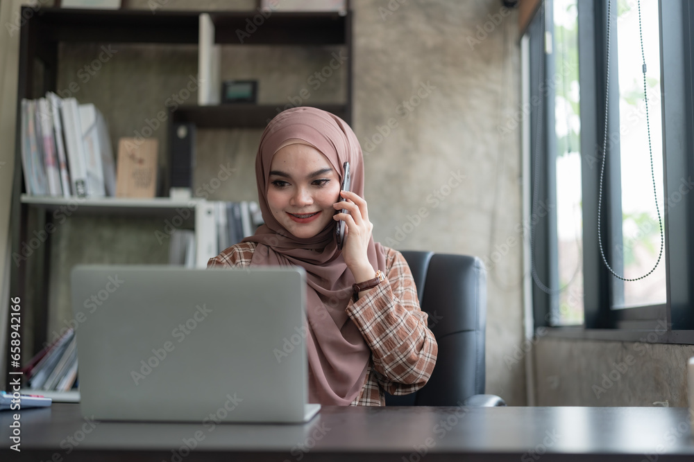 Beautiful muslim businesswoman or female executive manager wearing ...