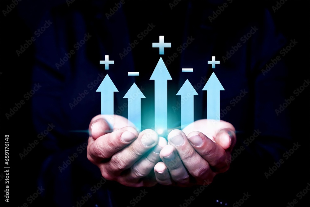 Hand holding chart with plus and minus symbol on chart. Concept of ...