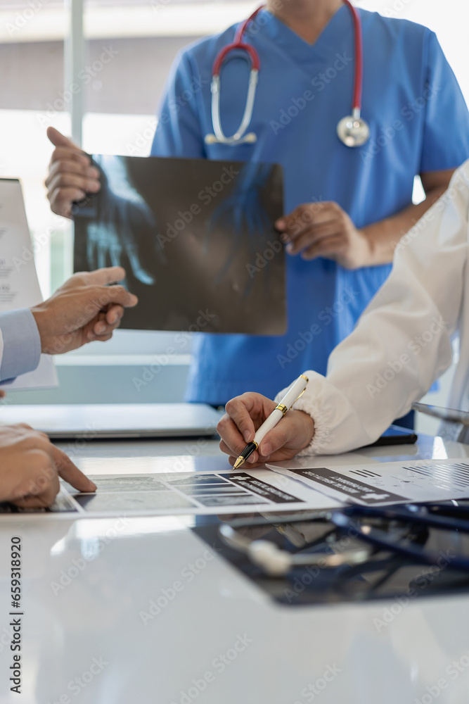 Brainstorming and planning. Doctors, nurses and laptop computers on ...