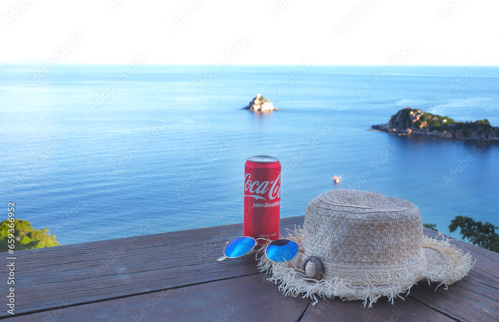 Red can of Coca-Cola soft drink over summer sea background. Stock Photo ...