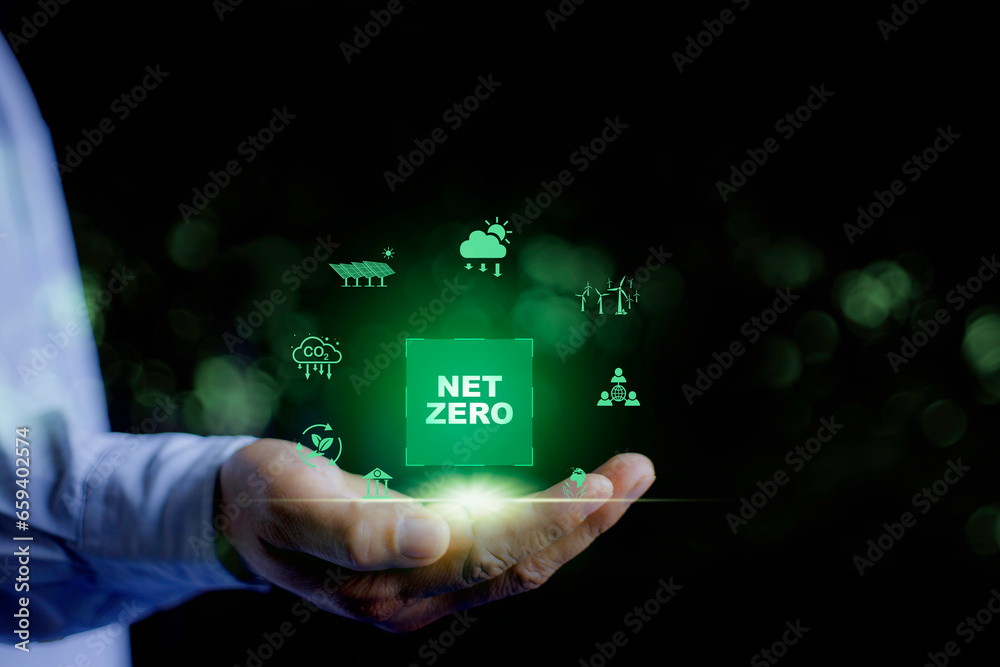 Net zero icon on businessman hand. Net zero for environmental, social ...