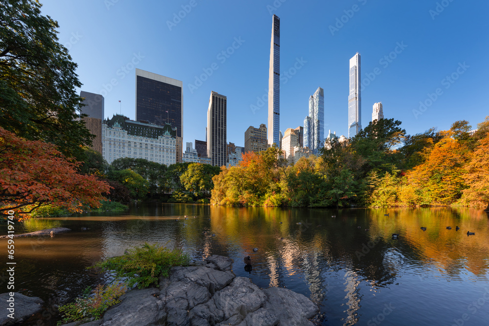 Central Park by The Pond in Fall with Billionaires Row supertall ...
