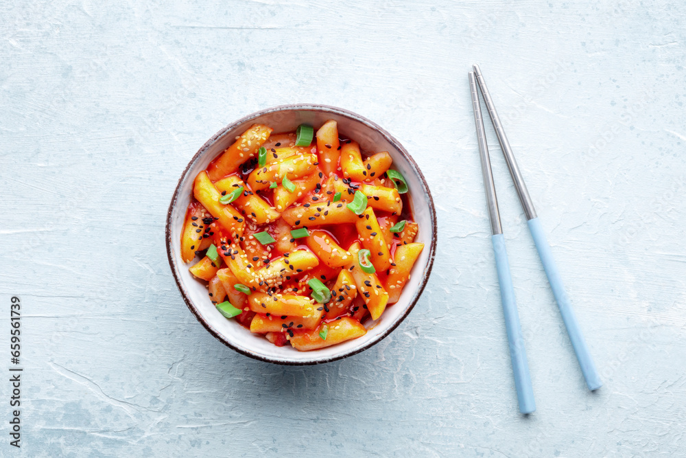 Tteokbokki or topokki, Korean street food, spicy rice cakes in red ...