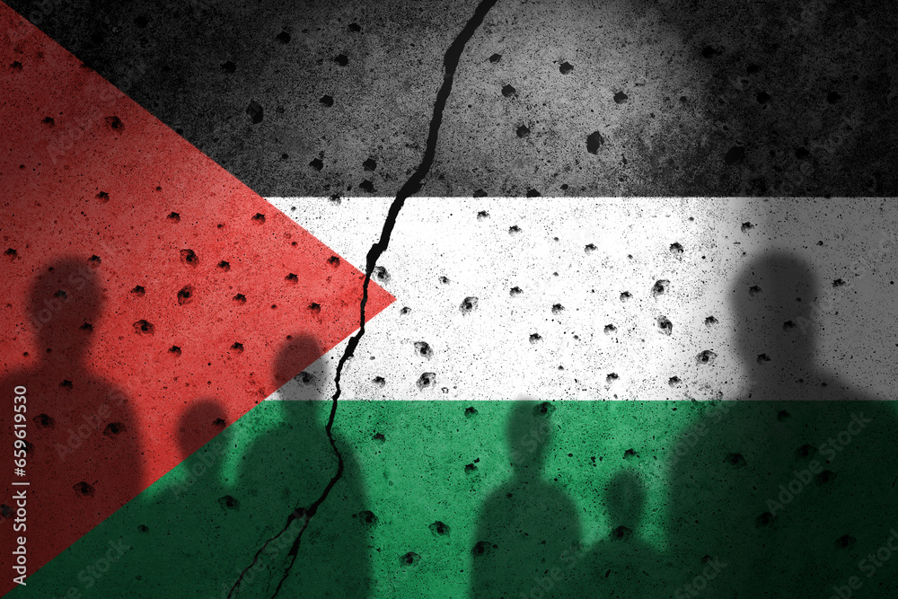 Flag of Palestine painted on the concrete wall with human silhouettes ...