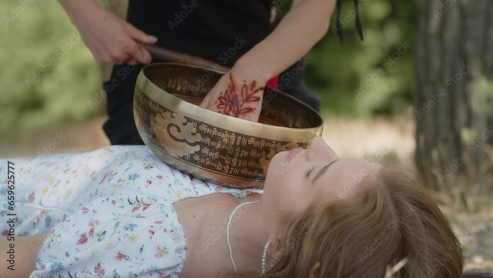 A shaman girl performs a cleansing ritual for prosperity, longevity and ...