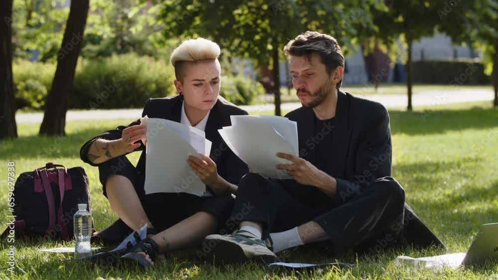 Full body view of two successful lawyers partners working on lunch ...