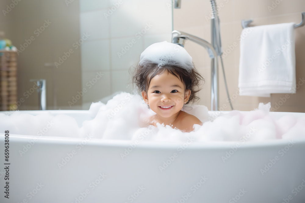 bath time, little asian child girl taking bubble bath in beautiful ...