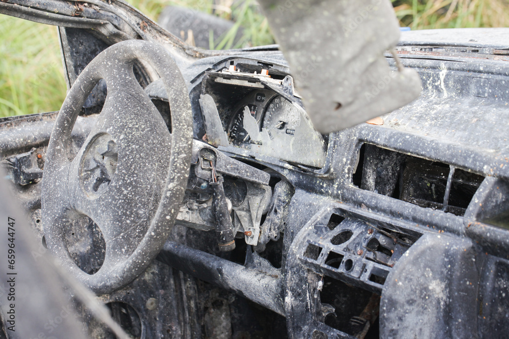 Inside of a car wreck. Abandoned old auto. Destroyed dashboard ...