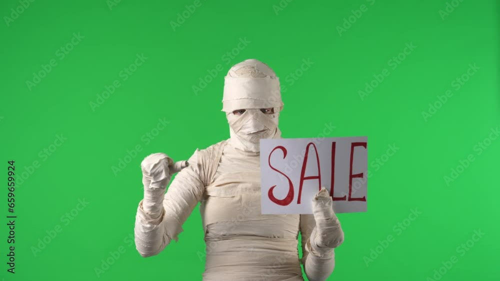 Green screen isolated chroma key video capturing a creepy mummy raising ...