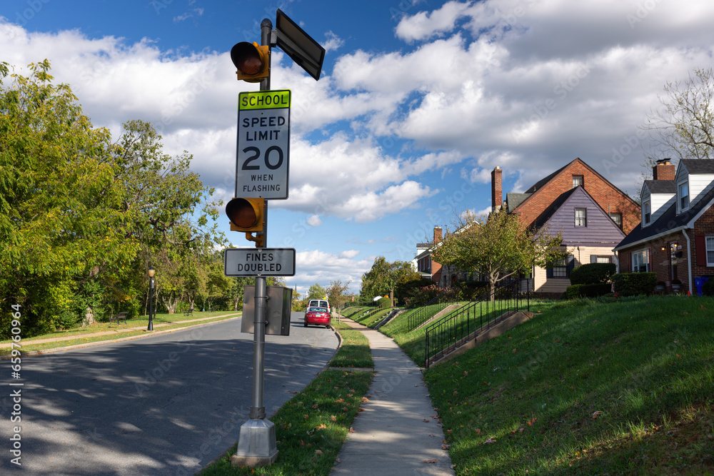 Quiet suburban street in Frederick, MD, with two-story houses, green ...