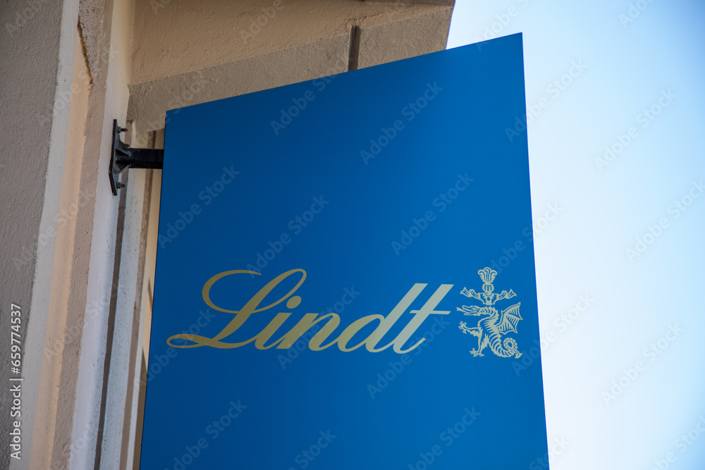 Lindt logo sign facade and text brand of store swiss bar chocolate and ...