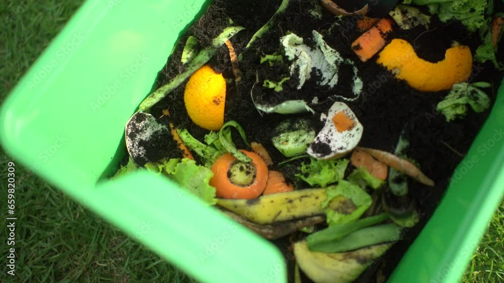 Compost bin and composted soil from kitchen ,food waste, fruit ...