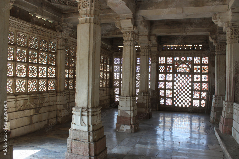 Stone jali work. While the ringed domes, the profusion of pillars and ...
