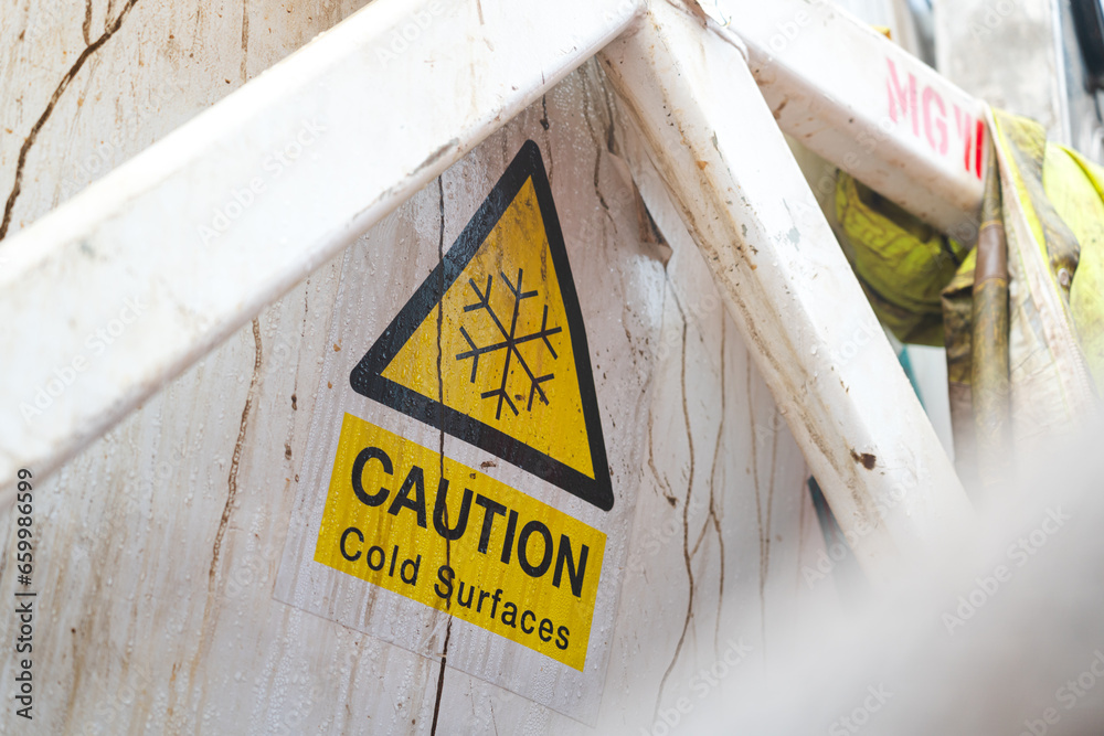 Safety sign of "Cold surface" caution which showed on liquid nitrogen ...
