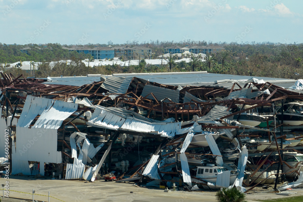 Hurricane Ian destroyed boat station in Florida coastal area. Natural ...