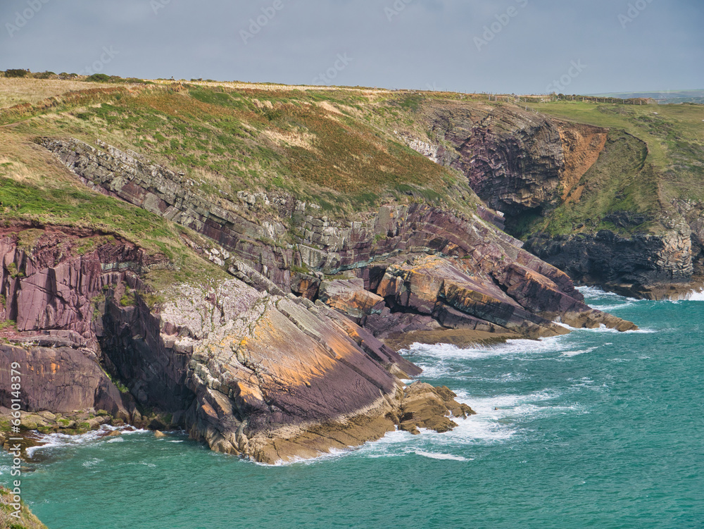 Coastal red cliffs near Solva in Pembrokeshire, Wales, UK - steeply ...