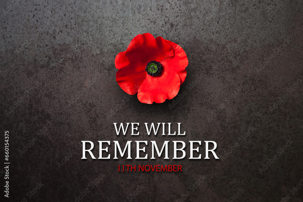 We Will Remember 11th November inscription with Poppy flower on rusty ...