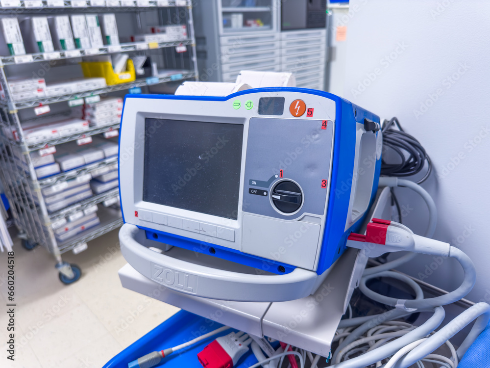 hospital defibrillator AED unit ready for action, symbolizing emergency ...