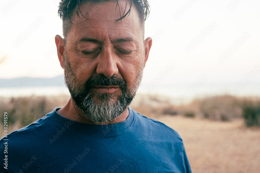 Sad man portrait expression face close up in outdoor. One adult mature ...