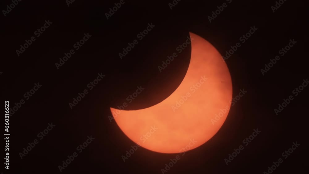 Movement of Clouds in Front of Sun During a Solar Eclipse. Moon Cast ...