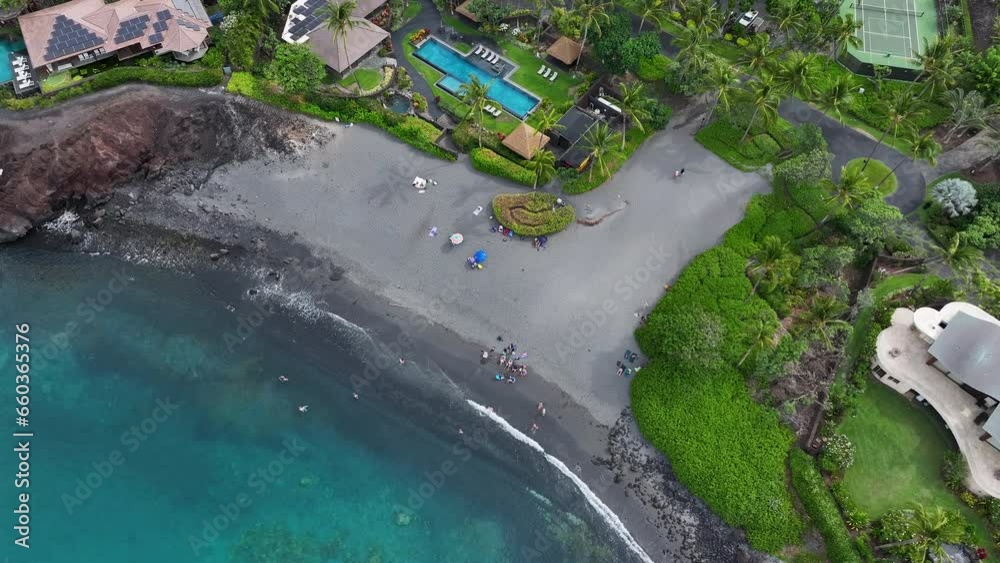 Aerial black sand lava beach ocean bay Kona Hawaii. Big Island. Luxury ...