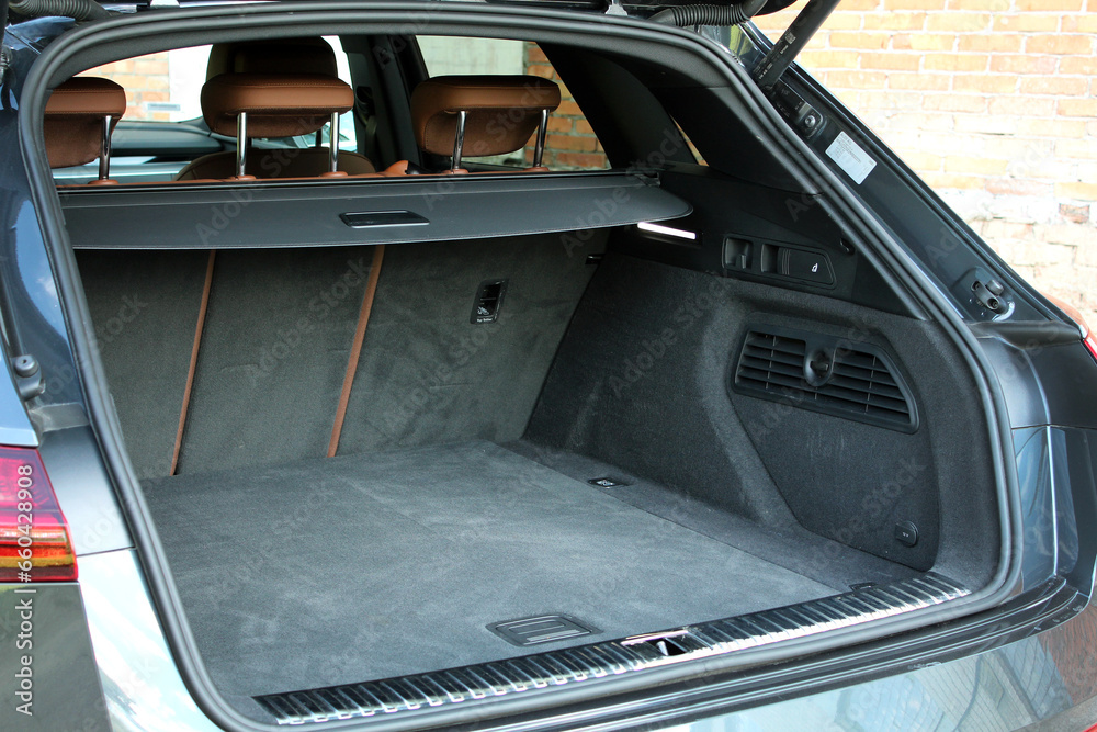 Modern electric SUV car open trunk. Modern electric car with open empty ...