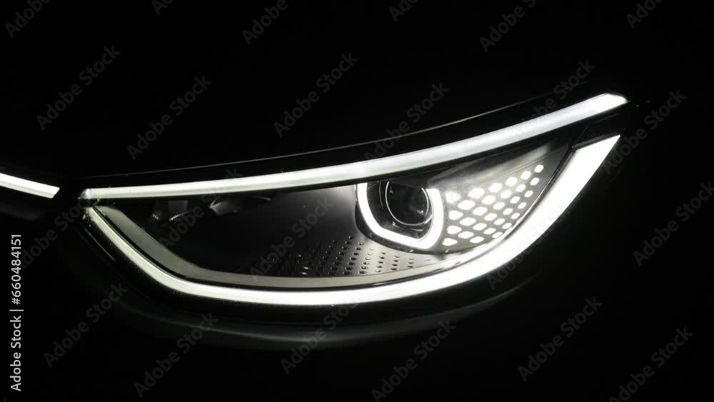 Switched on led matrix lights of luxury car. Car front full led matrix ...