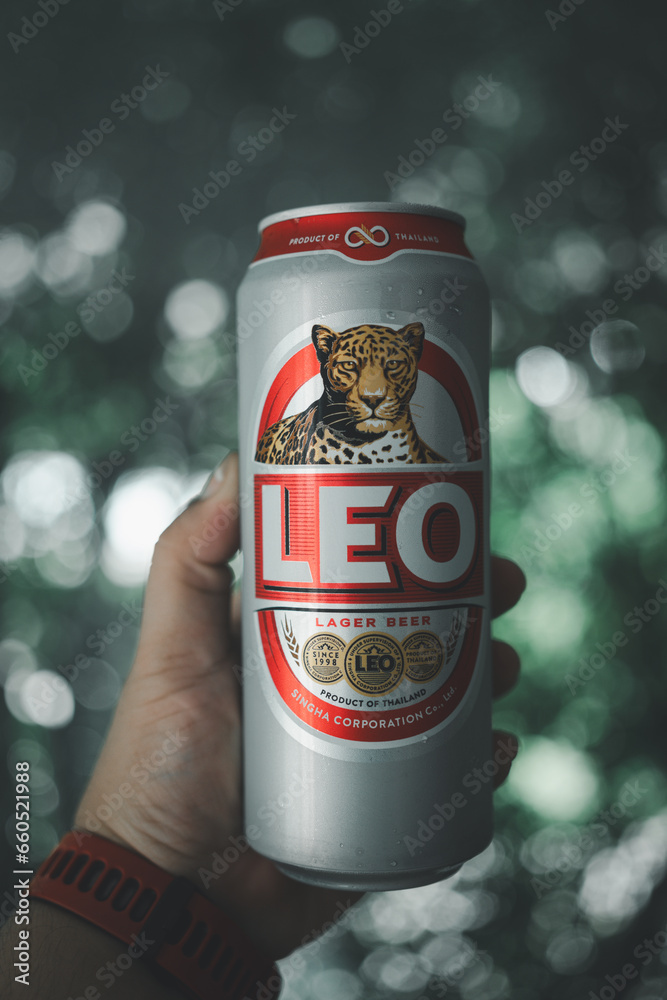 Bangkok, Thailand - October 11, 2023 : Holds a can of popular Thai beer ...