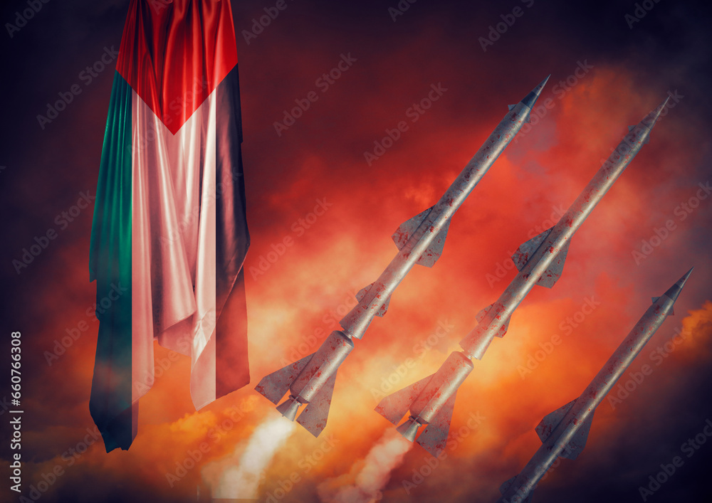 Missiles launched next to the Palestinian flag. Concept of the conflict ...