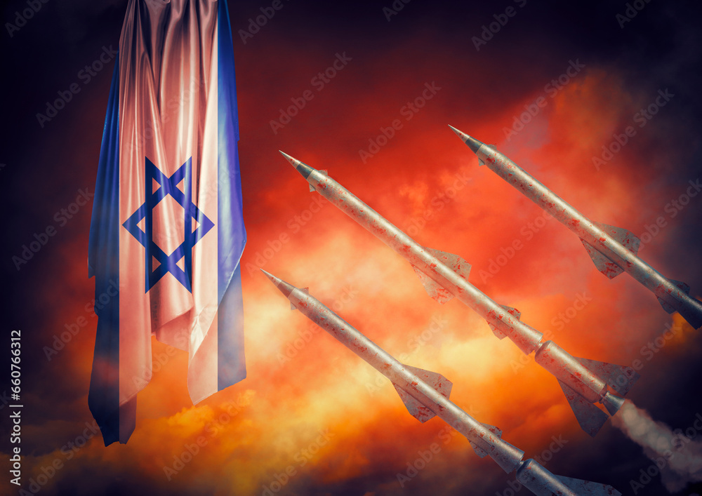 Missiles launched next to the Israeli flag. Concept of the conflict ...