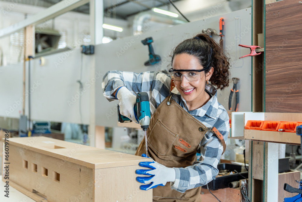 One Strong confident young aged women carpenter standing look at camera ...