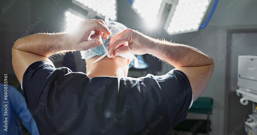 Surgery, preparation and doctor tie mask in operating room for medical ...