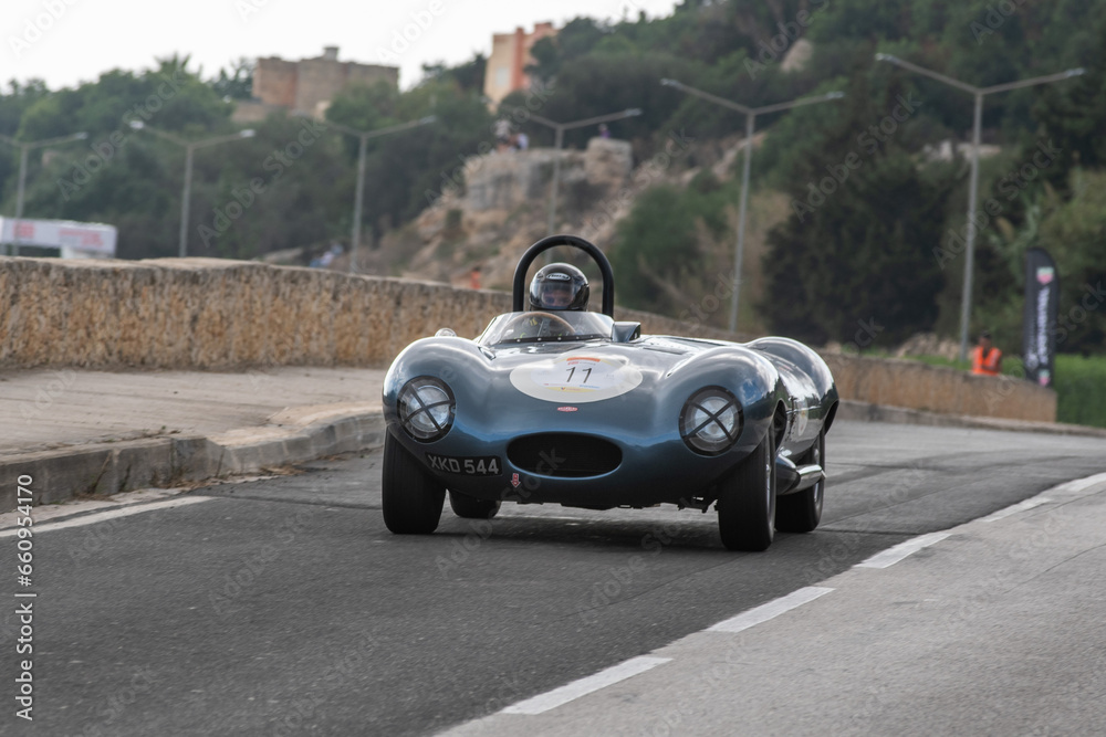 Preparations and qualifying races for drivers and cars on a road ...