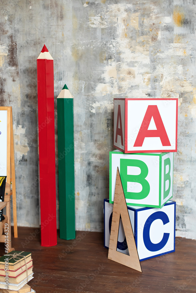 ABC letters alphabet on wooden cube blocks in pillar form. Interior of ...