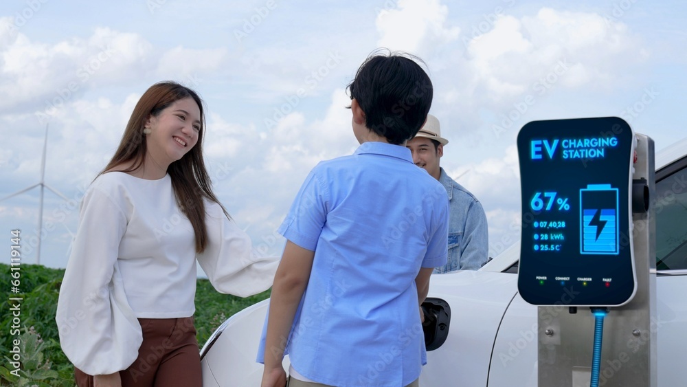 Modern family travel and nature with eco-friendly EV car concept ...