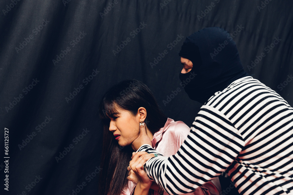 Strange man is attacking young and defenseless woman. Sexual abuse is a ...