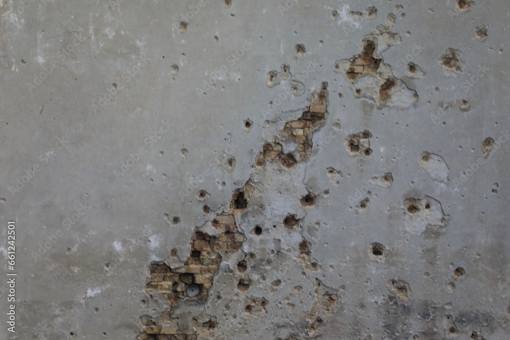 Bullet and mortar holes damage the building facade Stock Photo | Adobe ...