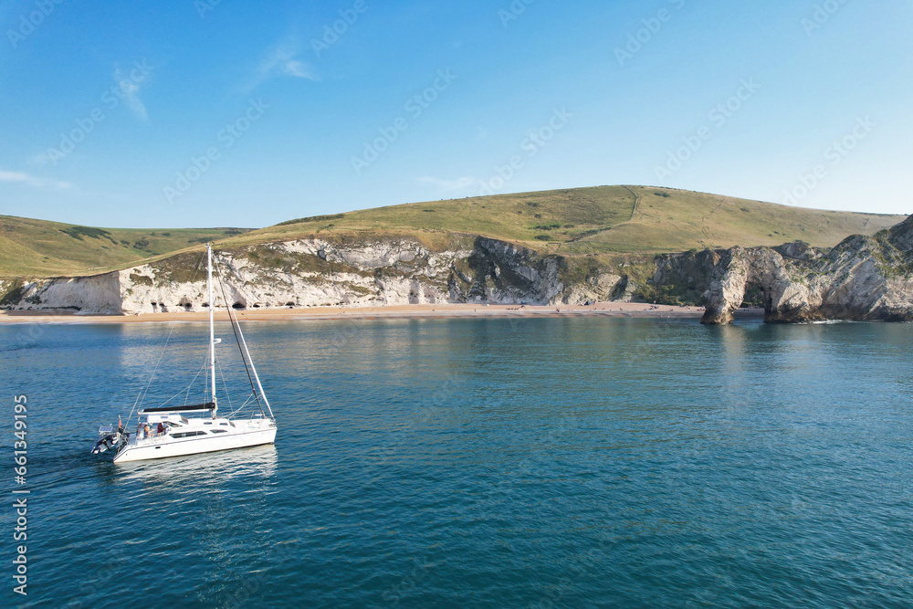 People are Enjoying Boat Ride at British Ocean of Durdle Door England ...